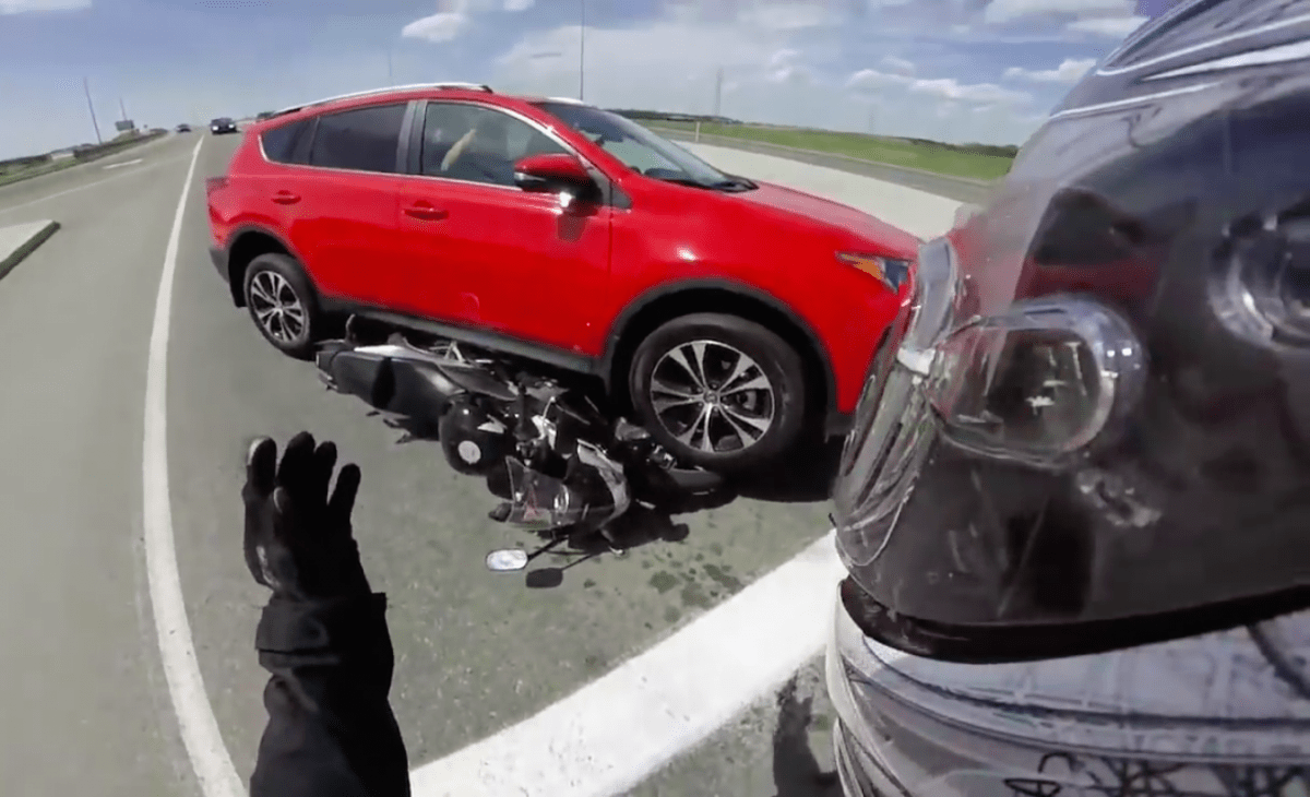 VIDEO: Student driver reverses into a motorcycle