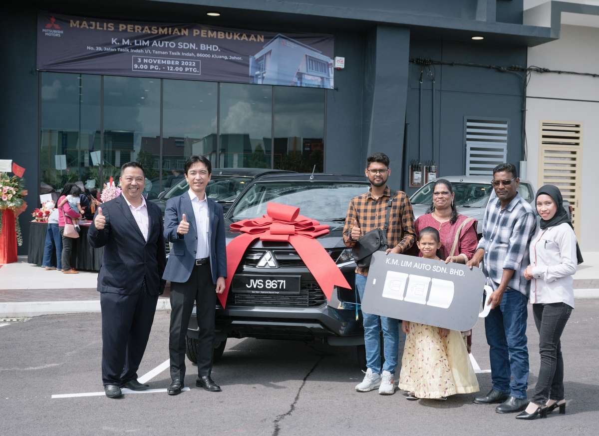 Handing over a brand new Mitsubishi Triton to a proud owner during the ...
